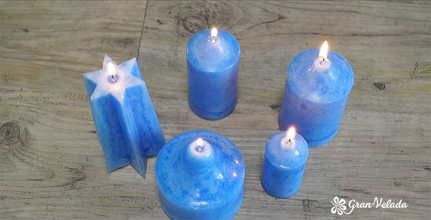 Velas geometricas de diferentes formas, colores y texturas.